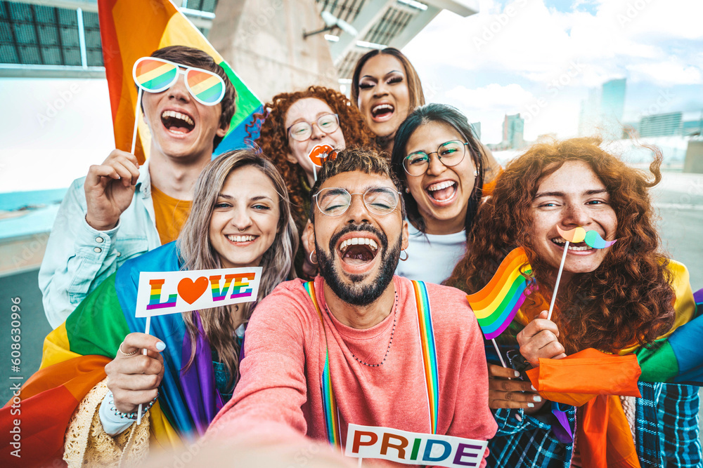 Diverse group of cheerful young people celebrating gay pride day - Lgbt ...
