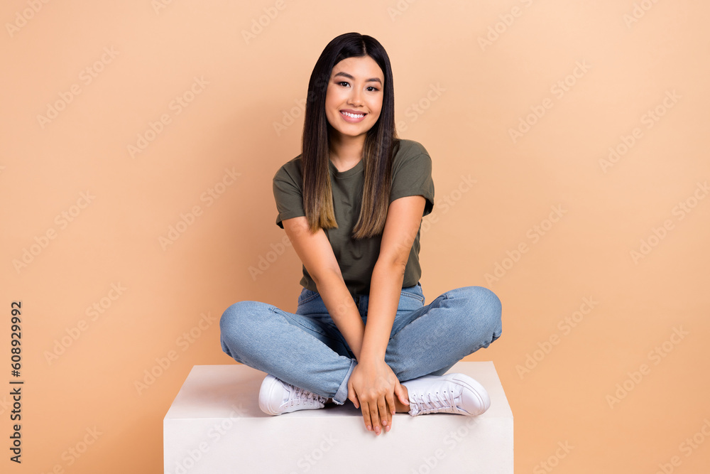 Full length size photo of cute lady vietnamese sit platform box posing ...