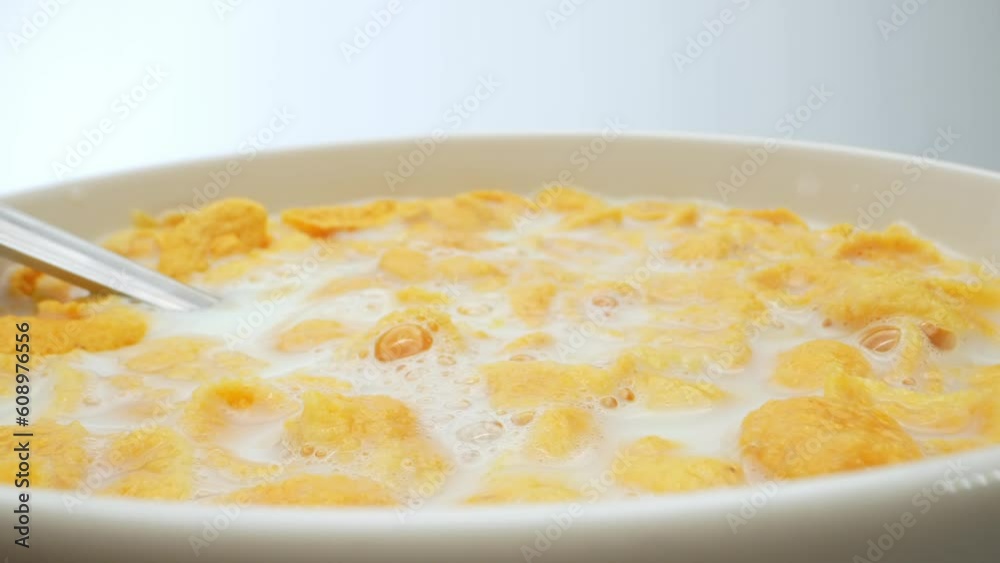 Experience the tantalizing allure of corn flakes in a bowl of velvety ...
