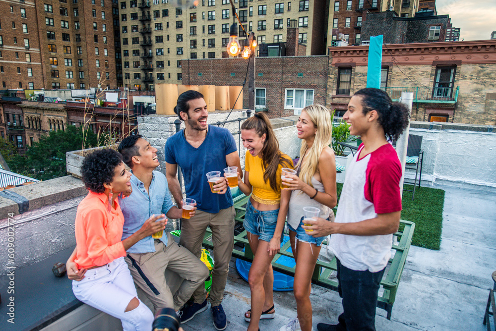 Foto de Multiethnic group of young happy friends bonding and having ...