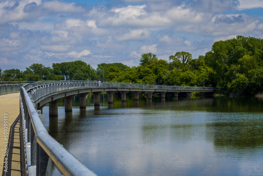 Graceful Curves: Gray's Lake Bridge Over the Water Stock Photo | Adobe ...