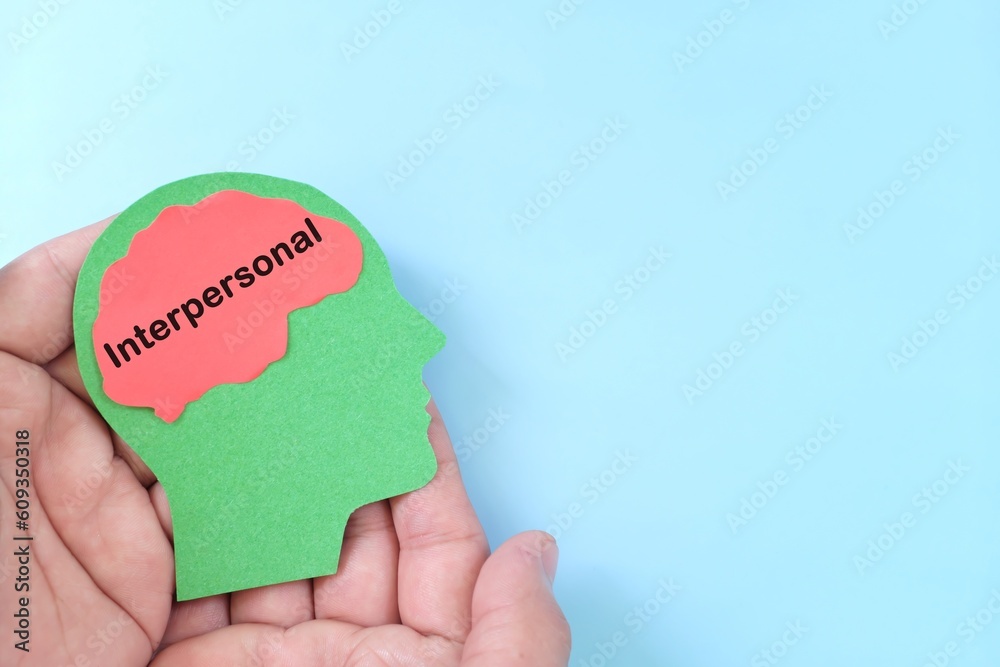 Interpersonal intelligence in psychology concept. Hand holding human ...