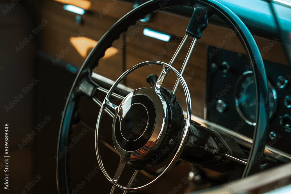 Steering wheel in a classic car, old automobile, vintage vehicle ...