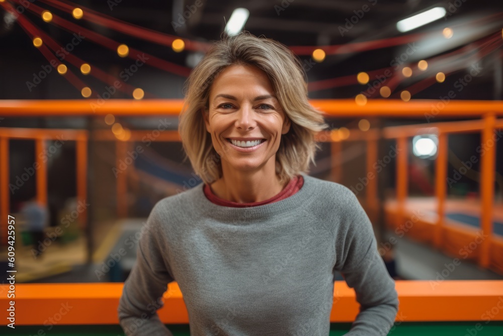 Medium shot portrait photography of a satisfied woman in her 40s that is wearing a cozy sweater ...