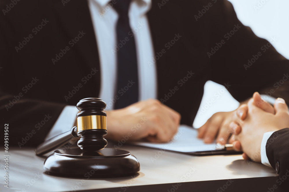 Lawyer colleagues or legal team working or drafting legal document at ...