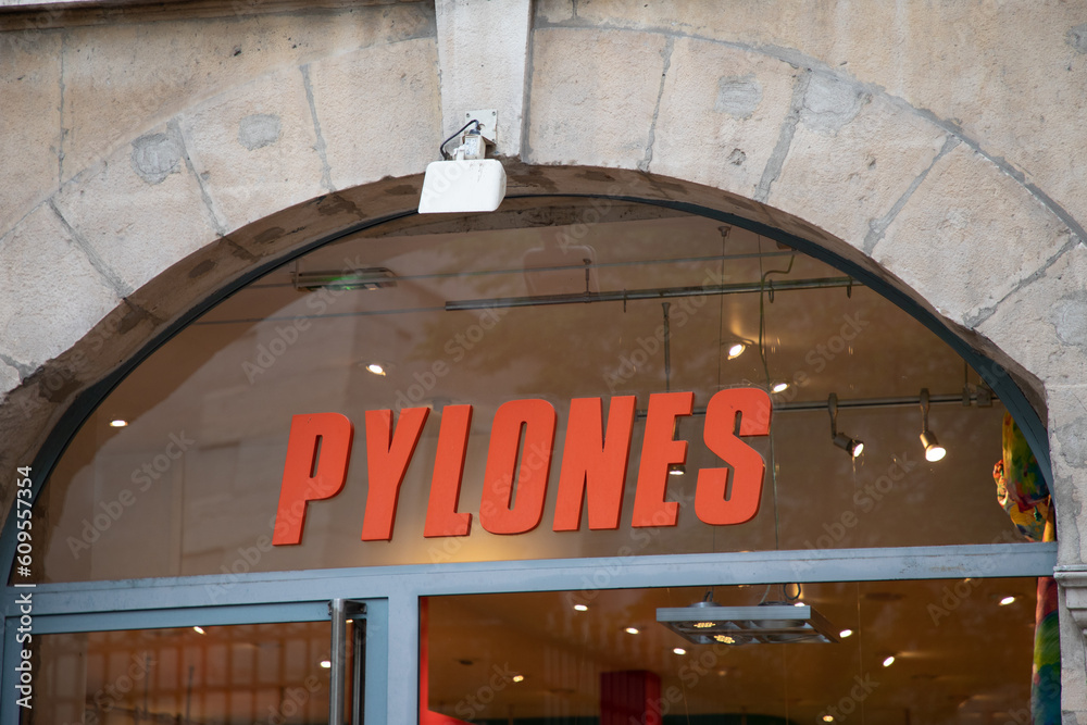 pylones logo sign and brand text front wall entrance facade shop chain ...