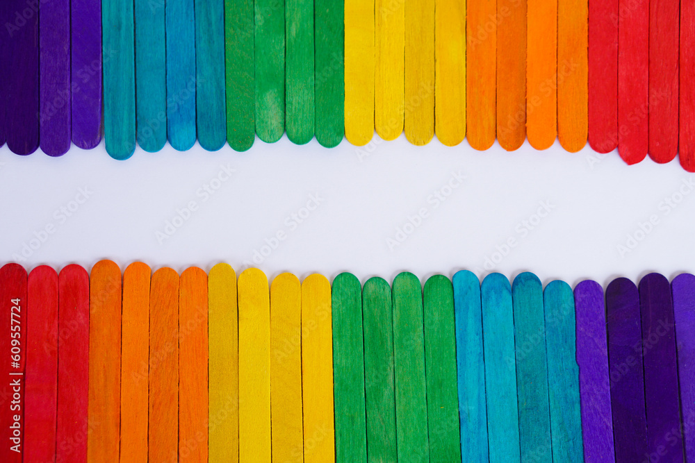 Colorful of rainbow colors made from ice cream sticks and arranged on ...