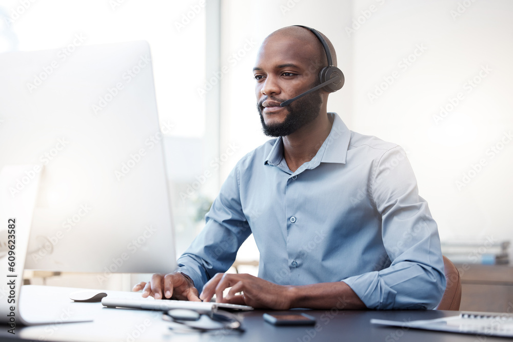 Black man typing at computer, call center and contact us, communication ...
