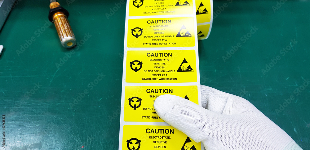 Yellow caution label in electronic industry,CAUTION Electrostatic ...