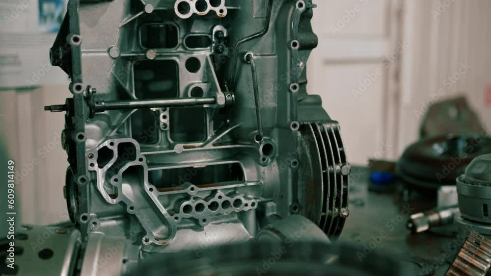 Close-up of parts of a clean engine block removed from a car for repair ...