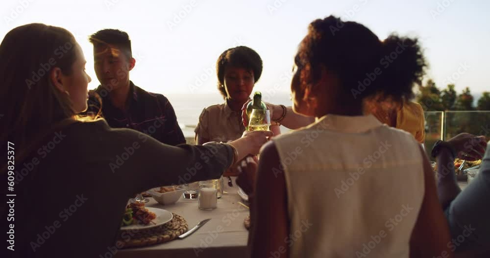 Group, friends and outdoor dinner at sunset and drinks, food and wine ...