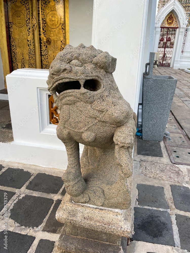 Foo Dog Antique Chinese Statue in front of the door. Chinese lion dog ...