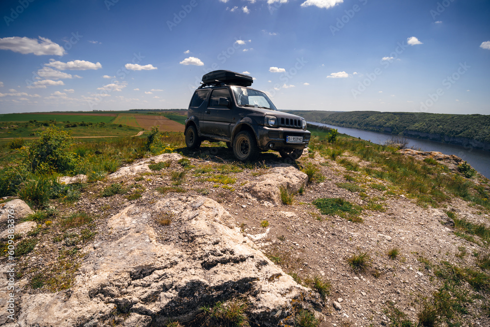 Subich, Khmelnytskyi, Ukraine - May 14, 2023: Suzuki Jimny JB43 with Niken roof rack box, 4x4 ...