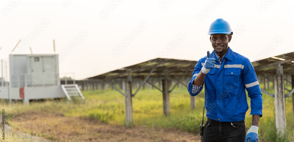 African american technician check the maintenance of the solar panels ...