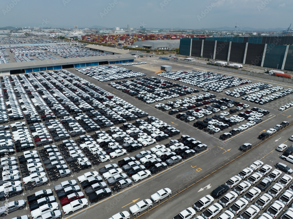 Aerial view of new cars stock at factory parking lot. Above view cars ...
