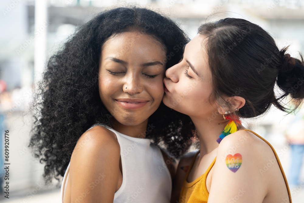 Portrait Of Happy Loving Homosexual Lesbian Lgbt Couple Kissing At City
