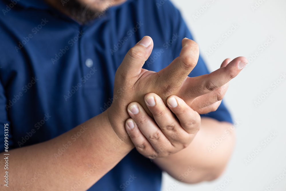 middle aged old asian man suffering from trigger finger, cps or carpal ...