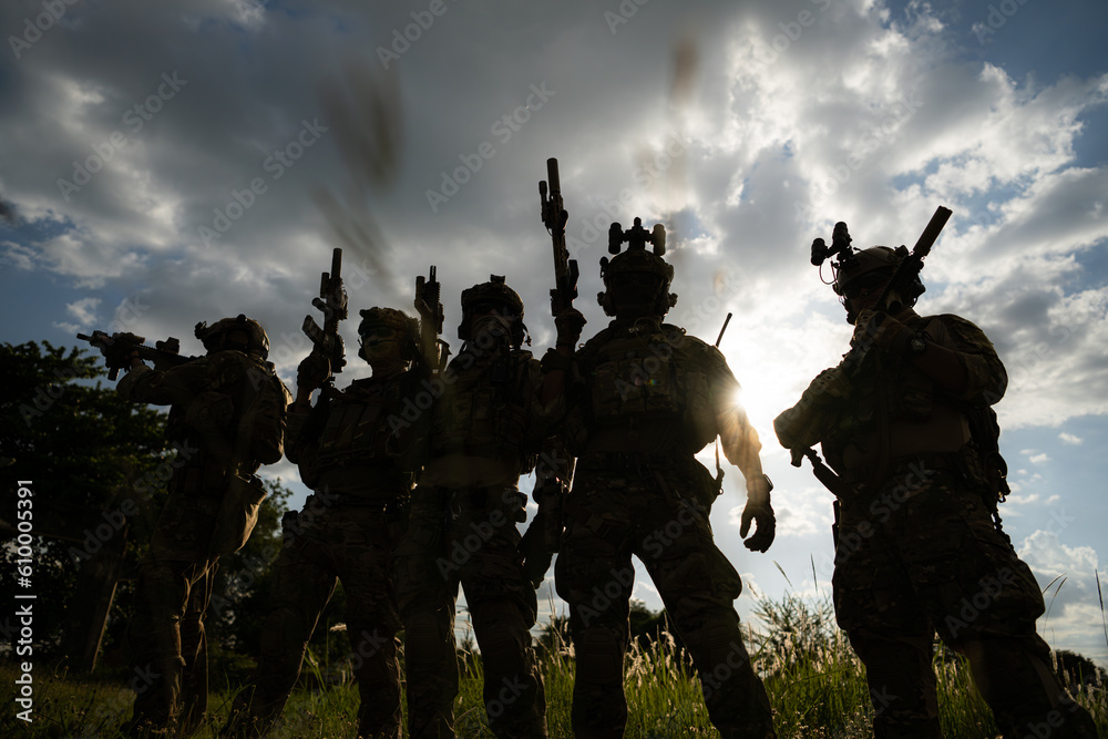 Soldier holding gun and showing action success or war win, special ...