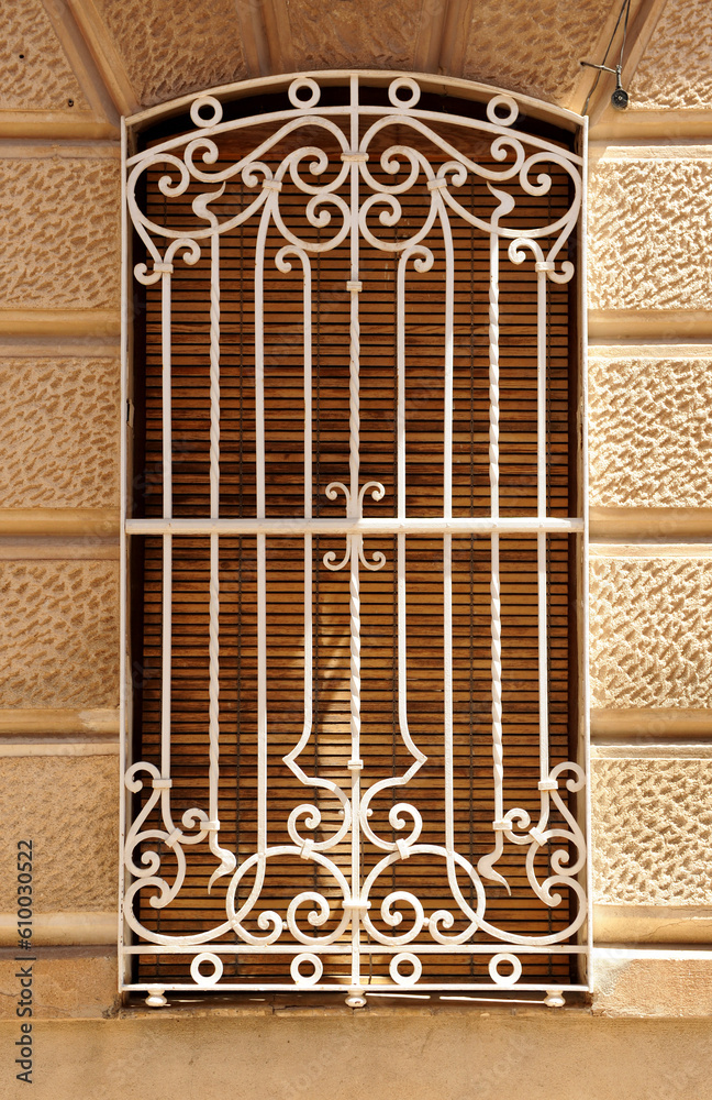 Barred window in modernist style of a Spanish house in Castilla, Spain ...