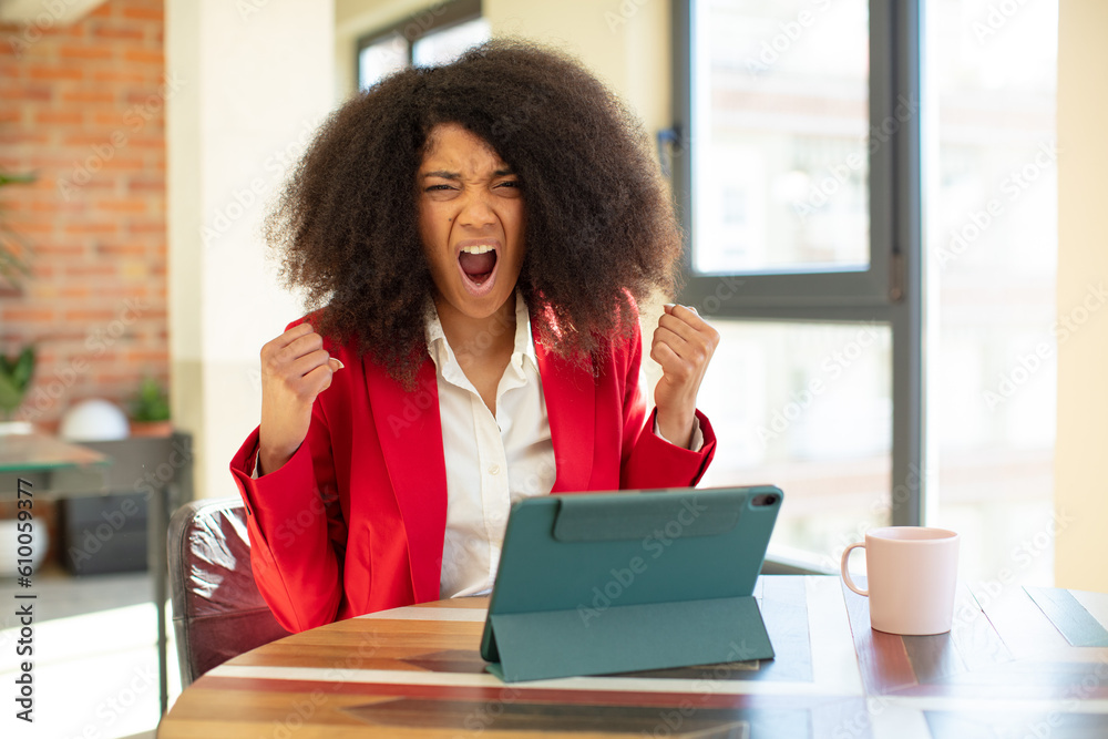pretty afro black woman looking angry, annoyed and frustrated ...