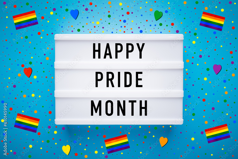 Happy Pride Month - Text on a light bow with blue background, pride ...