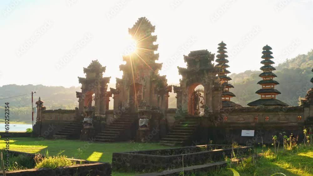 Beautiful Bali temple in traditional balinese architecture in the rays ...