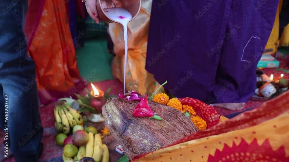 devotee doing holy rituals at festival from different angle video is ...