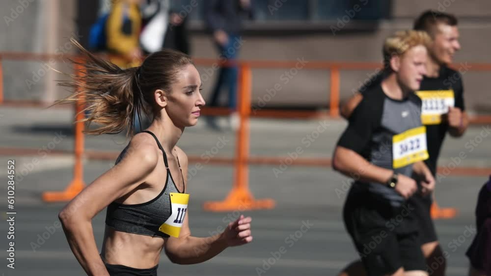 Female jogger run marathon. Thin girl work out. Woman runner jog long ...