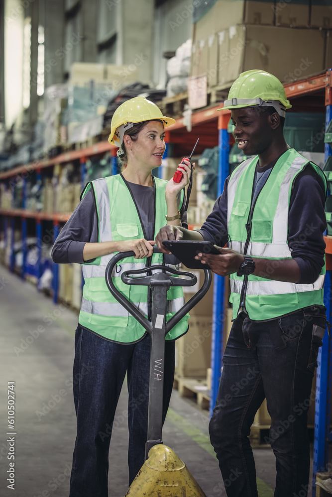 Warehouse supervisor uses two way radio for seamless communication and ...