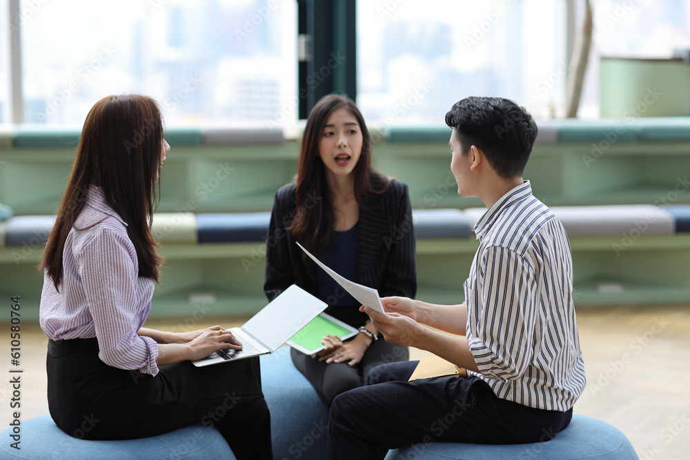 Collaborative process of young asian business people team working ...