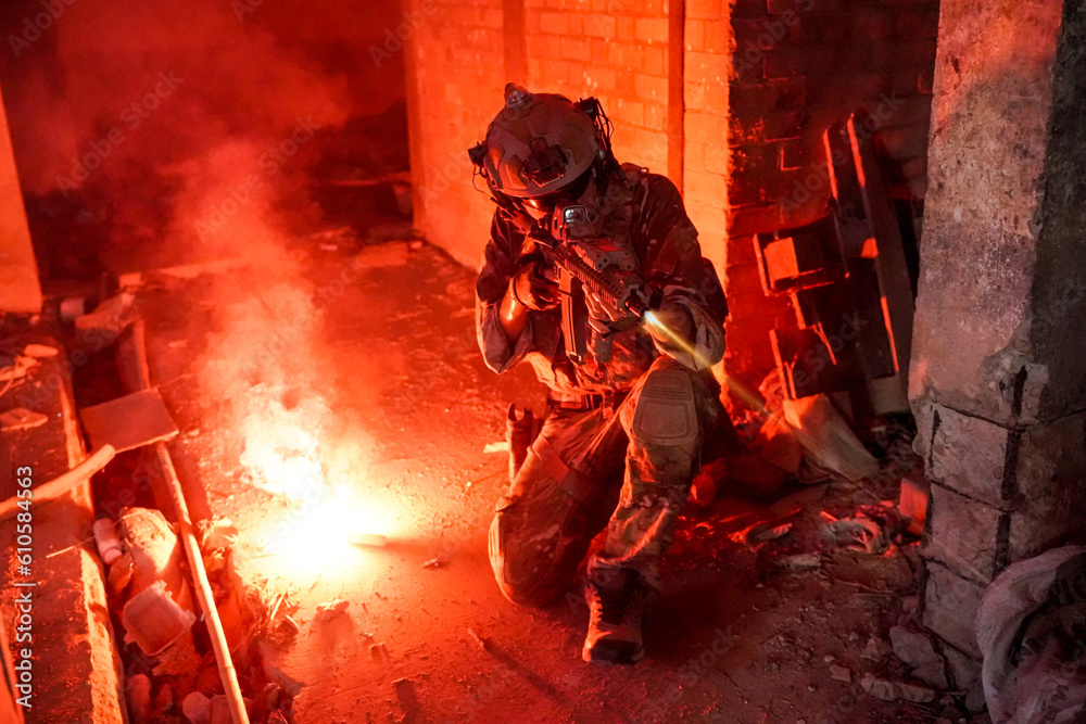 Infantry soldier shooting during military combat training.. Army elite ...
