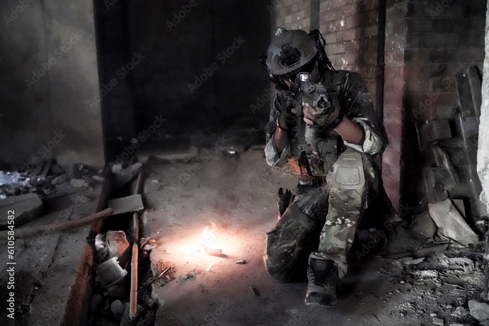 Infantry soldier shooting during military combat training.. Army elite ...