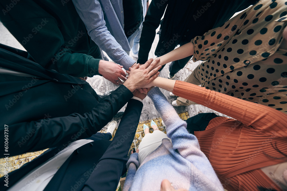 A top view photo of group of businessmen holding hands together to ...