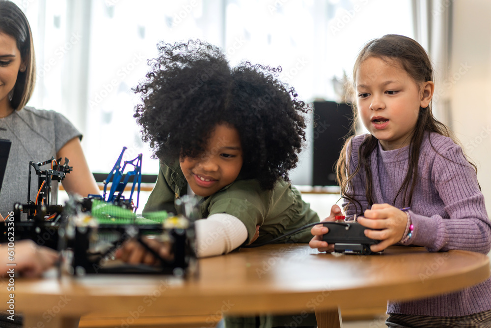 Portrait happy teacher help school children student having fun activity ...