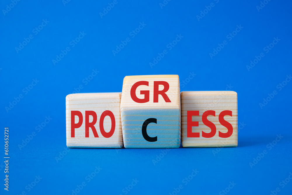 Process and Progress symbol. Wooden cubes with words Process and ...