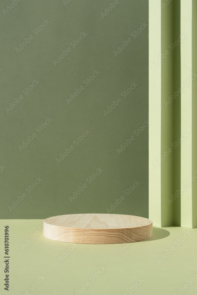 Geometric wooden podium on an abstract green background. A scene with a ...