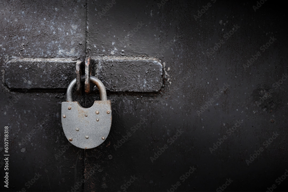 Old rusty lock on metal doors. Lock on the door with an empty place for ...