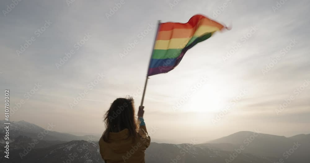 Pride Month LGBTQI plus Flag Flying in the Wind. Rainbow LGBT flag on ...