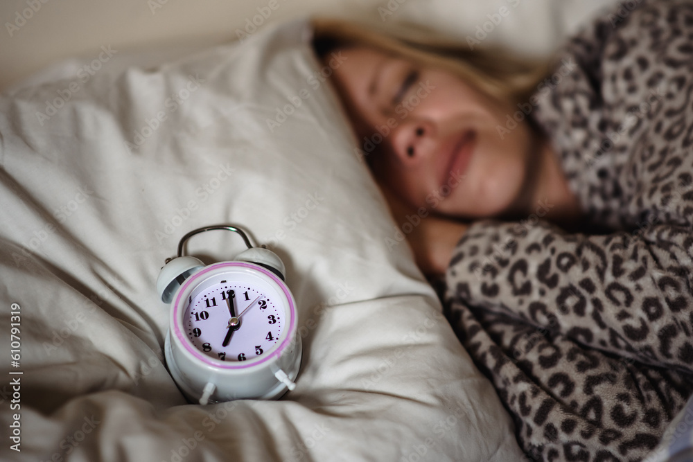 circadian rhythm, sleeping woman and alarm clock. Stock Photo | Adobe Stock circadian rhythm, sleeping woman and alarm clock. Stock Photo | Adobe Stock