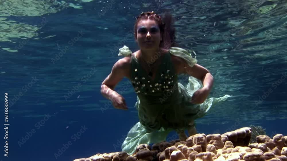 Mermaid girl underwater model in sea. Young woman freediver undine ...