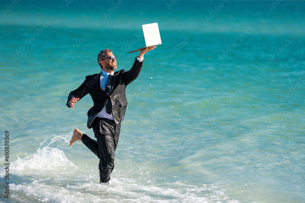 Excited millennial hispanic business man in suit on sea. Summer ...