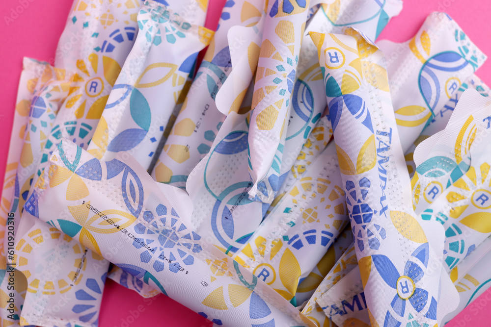 Magdalinovka, Ukraine - June 2, 2023. Tampax tampons in a wrapper on a ...