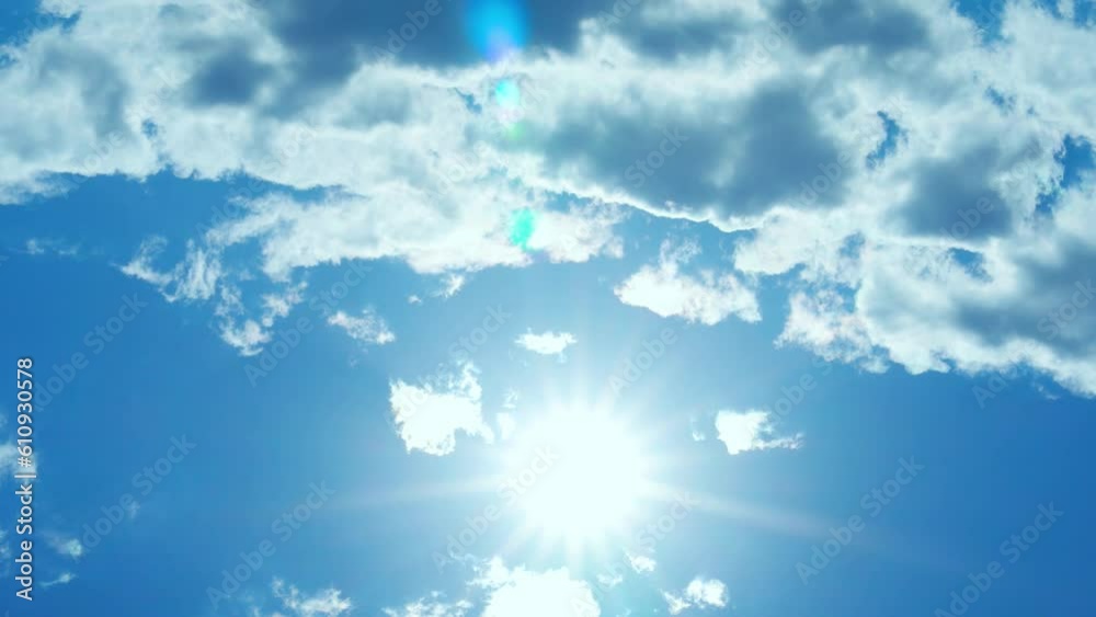 Blue Sky Glowing Sun and White Cumulus Clouds. Glow, Sunlight Sun Glare ...