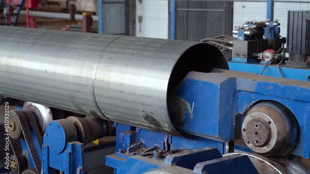 Pipe manufacturing plant. Pipe plant. Iron pipe welding. Pipe expansion ...