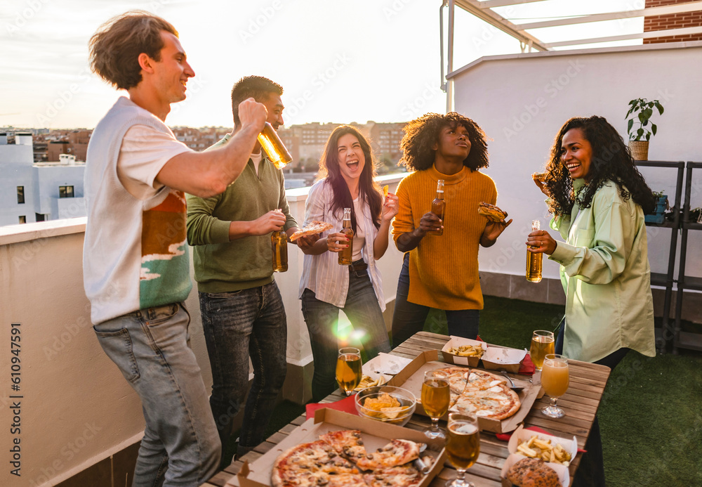 group of multiracial millennial friends on rooftop party Stock Photo ...