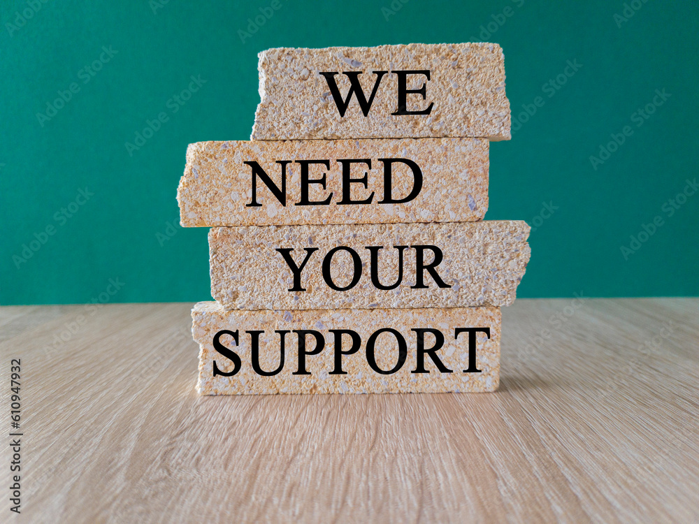 We need your support symbol. Brick blocks with words We need your ...