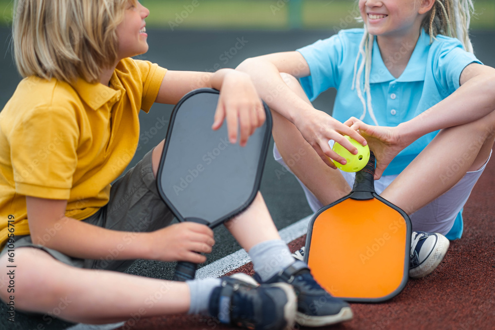 pickleball game, relaxing pickleball players kids boy and girl with ...