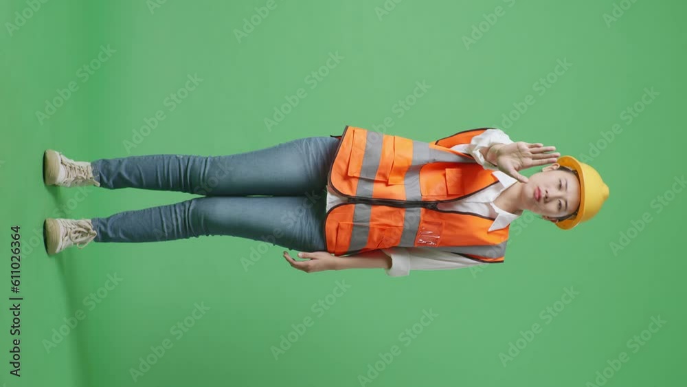 Full Body Of Asian Female Engineer With Safety Helmet Disapproving With ...