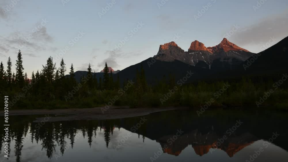 Timelapse sunset video of Three Sisters view seen in Canmore outside of ...