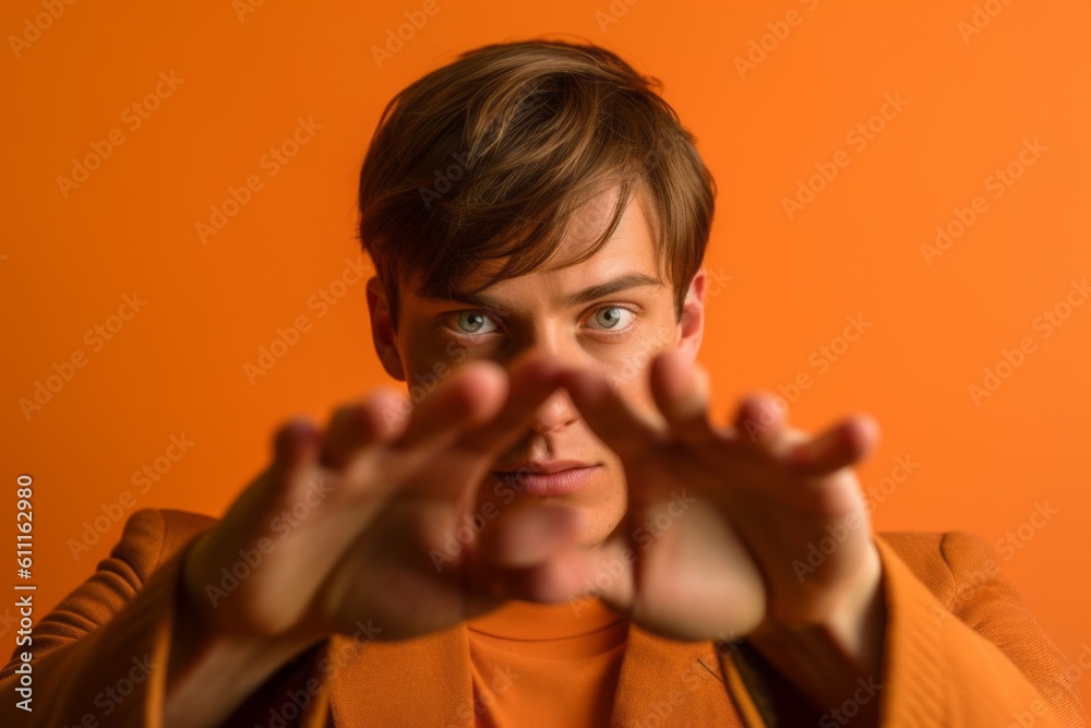Close-up portrait photography of a glad boy in his 30s forming a circle ...